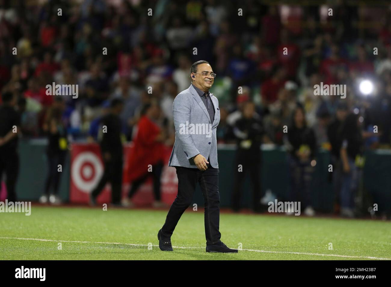 Puerto Rican singer Gilberto Santa Rosa smiles during the opening pitch ...