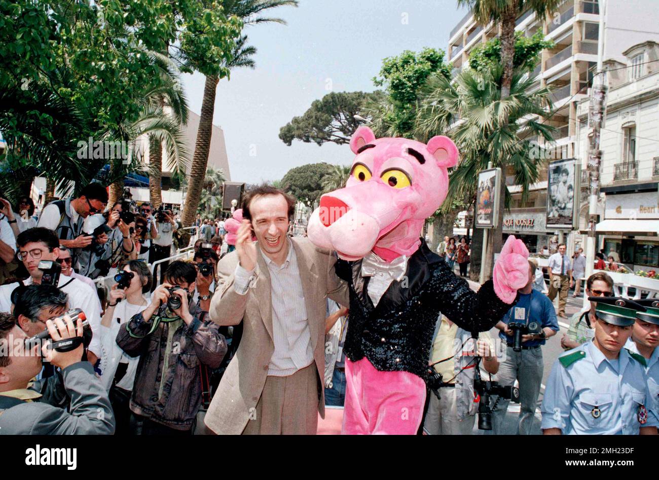 Italian comedic actor Roberto Benigni waves to the crowd in Cannes ...
