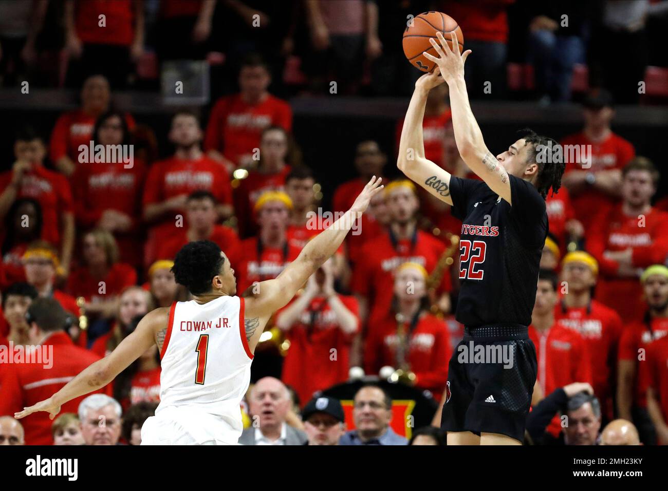 Rutgers guard Caleb McConnell (22) shoots against Maryland guard ...