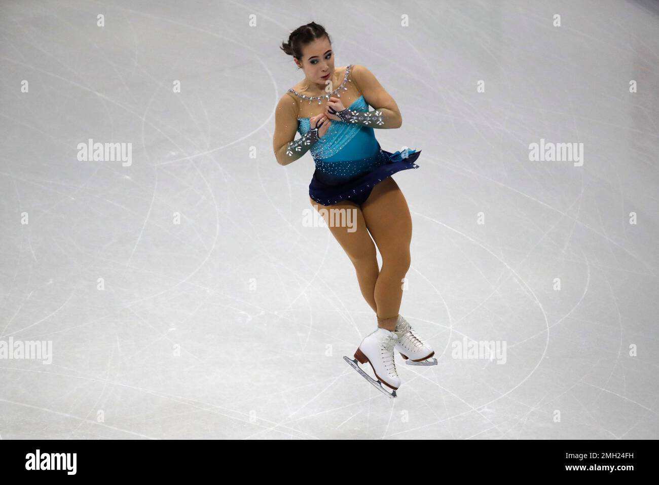 Canada's Emily Bausback performs during the ladies' single short ...