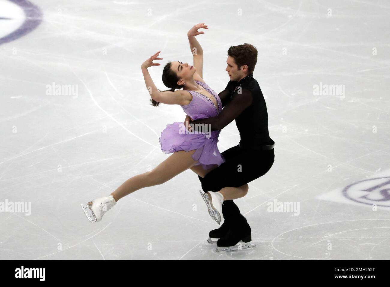 Canada's Evelyn Walsh and Trennt Michaud perform during the pair short ...