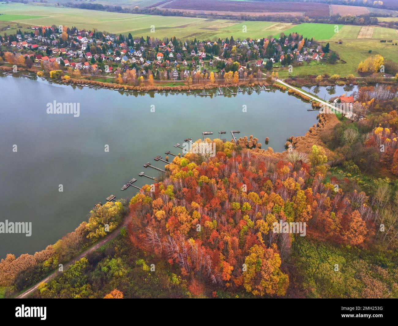 Aerial photo of Lake Jenői and its surroundings.A small lake located in ...