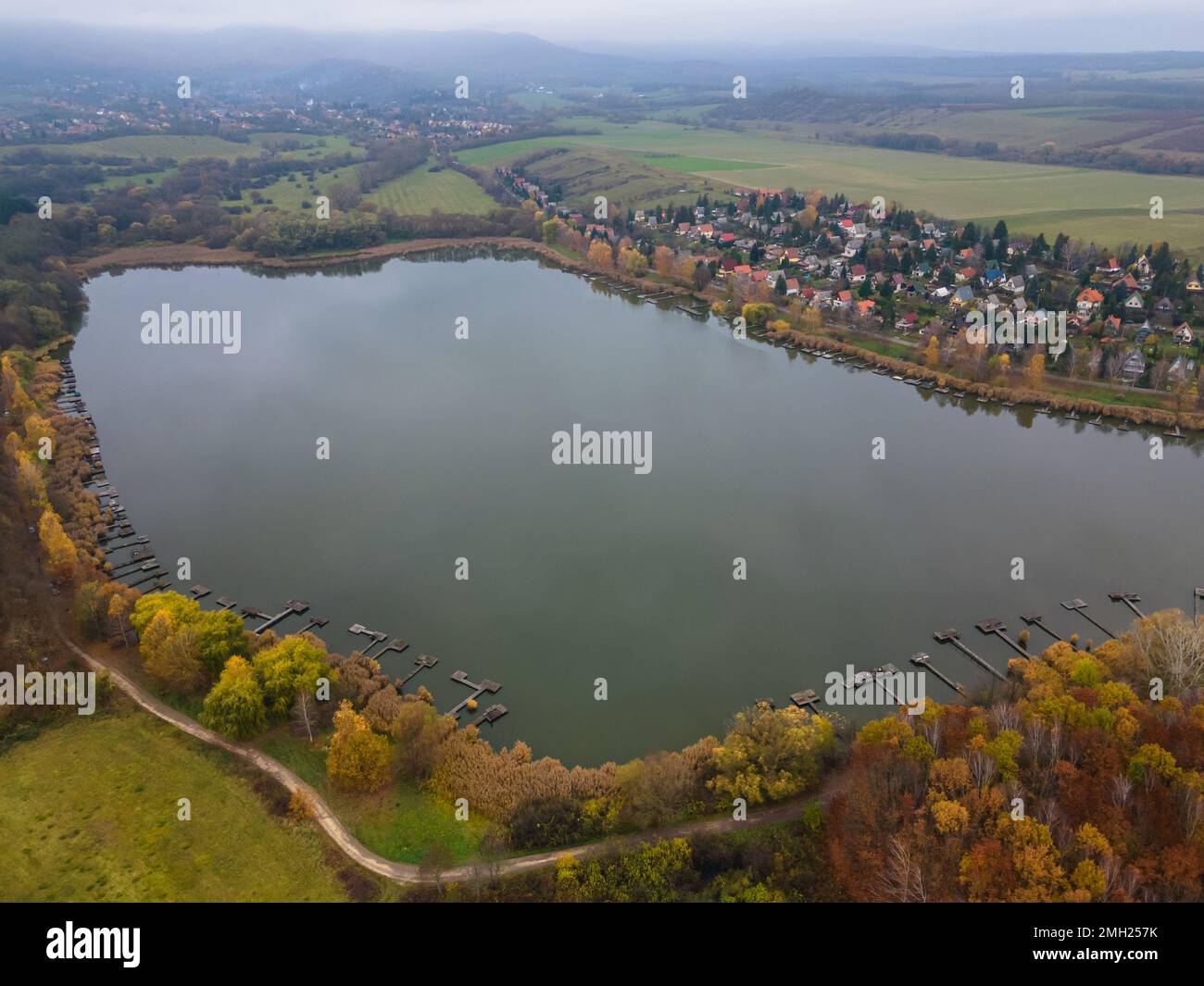 Aerial photo of Lake Jenői and its surroundings.A small lake located in ...