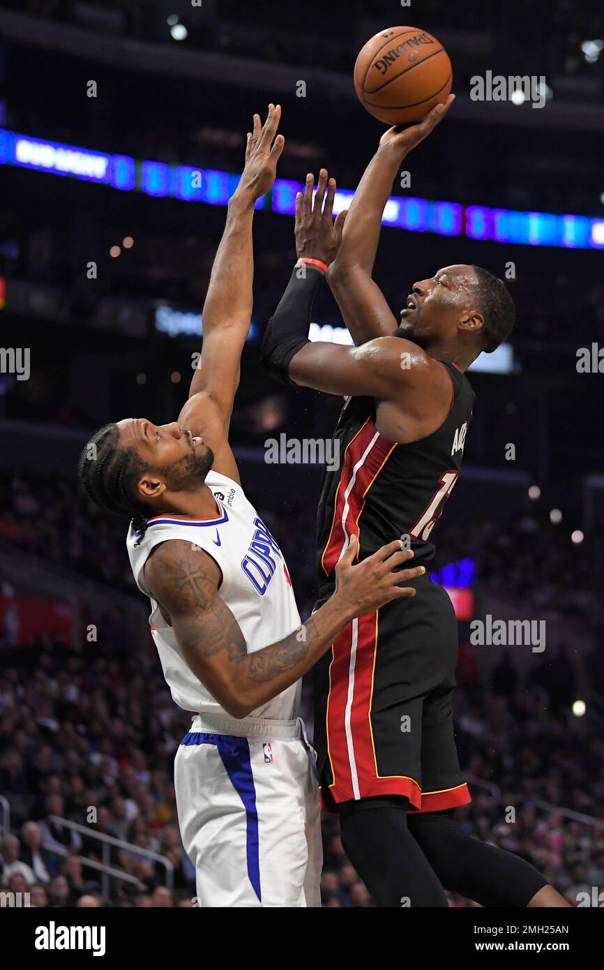 Miami Heat forward Bam Adebayo, right, shoots as Los Angeles Clippers ... Miami Heat forward Bam Adebayo, right, shoots as Los Angeles Clippers ...