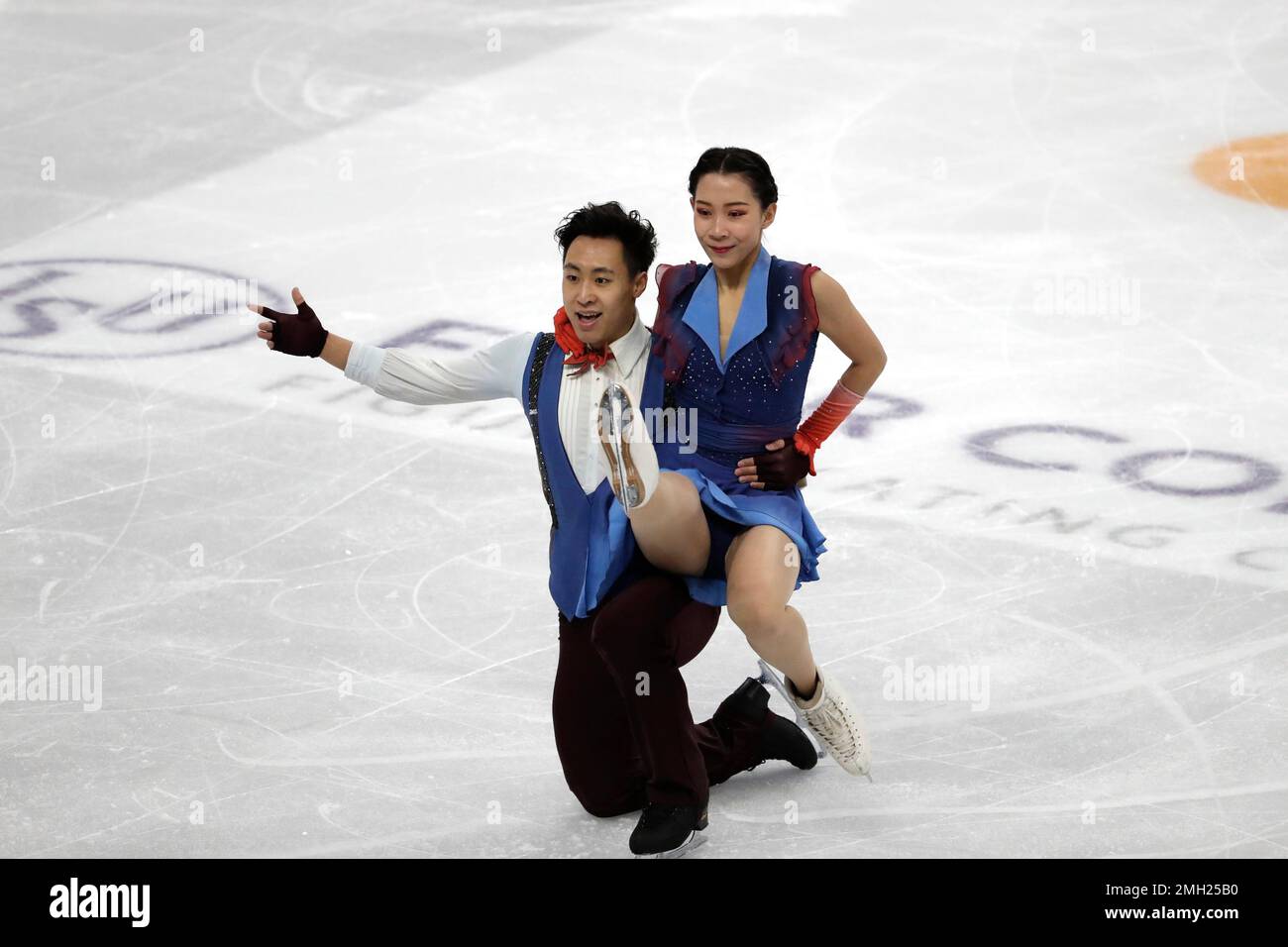 China's Ning Wanqi and Wang Chao perform during the Ice Dance Rhythm Dance competition in the ...