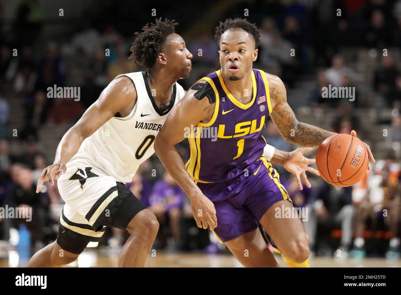 LSU guard Javonte Smart (1) drives against Vanderbilt's Saben Lee (0 ...