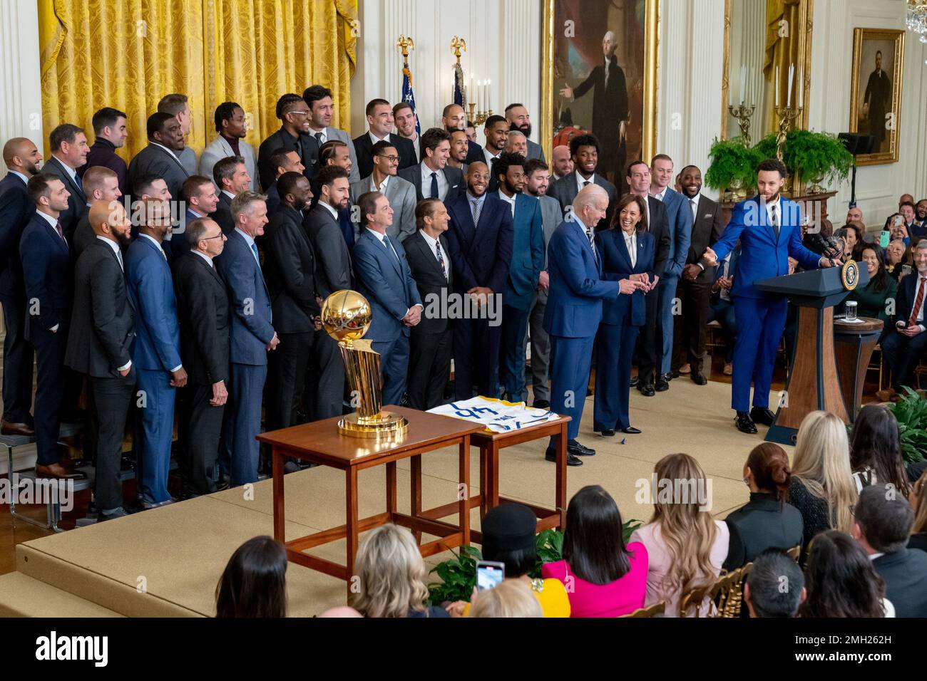 Golden State Warriors guard Steph Curry delivers remarks and presents ...