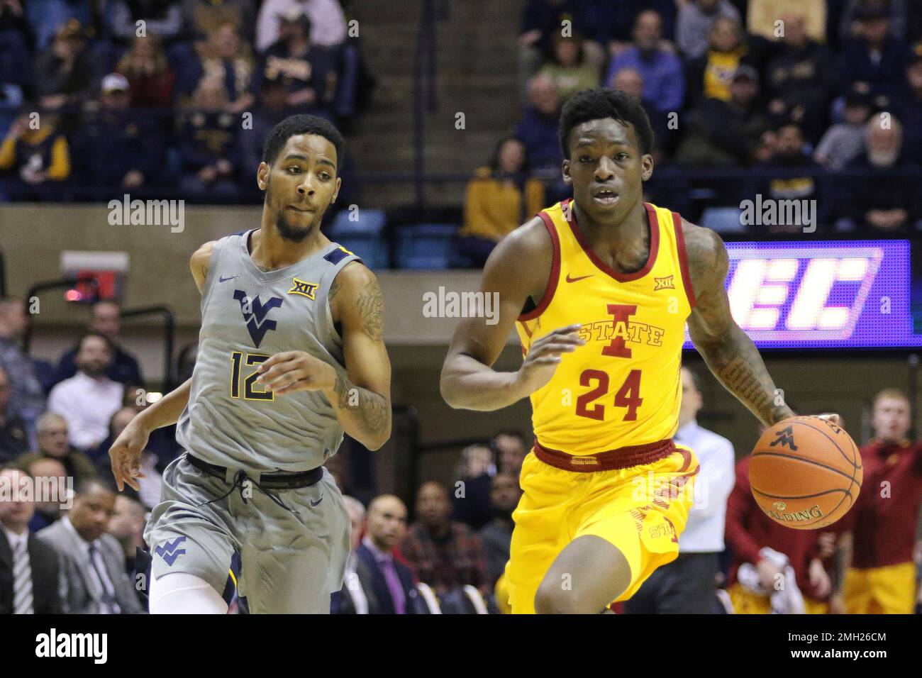 Iowa State guard Terrence Lewis (24) drives up court as he is defended ...