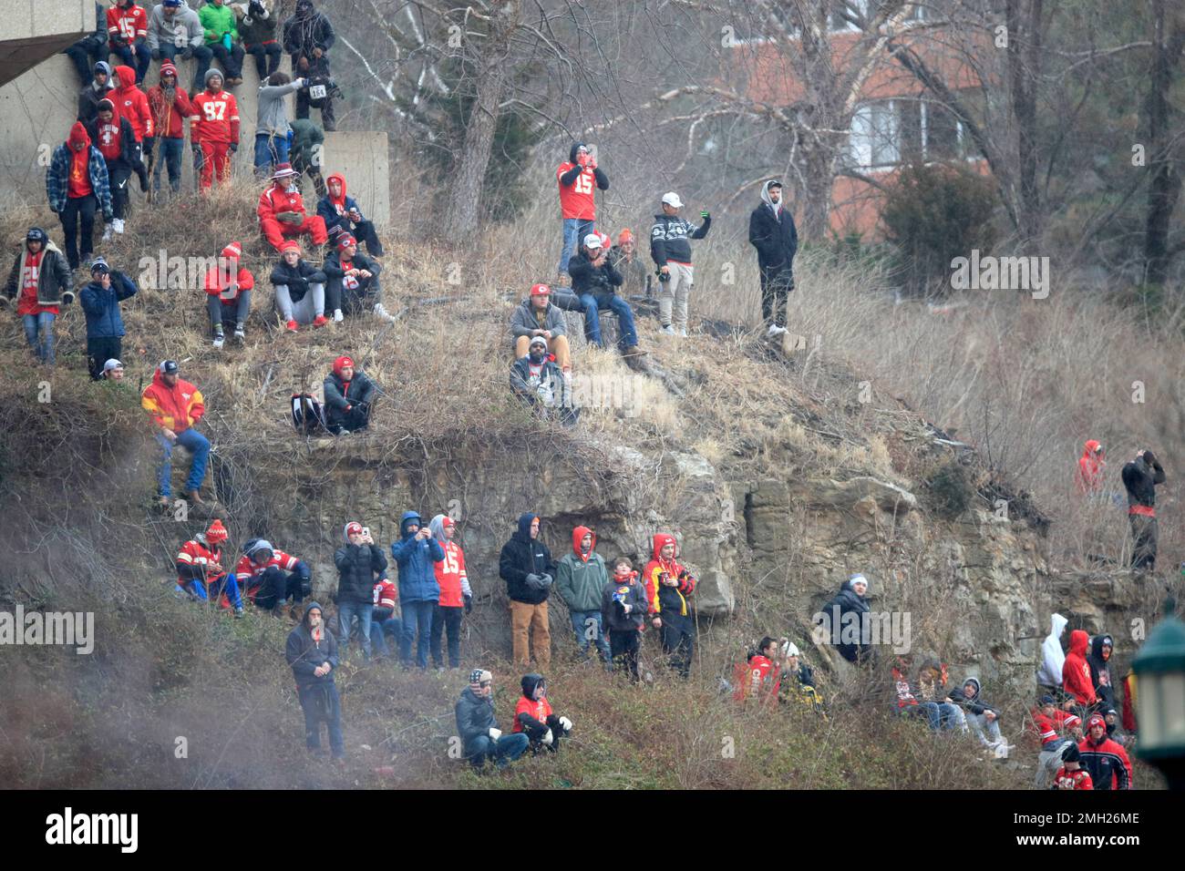 Kansas City Chiefs fans stand on a hillside during a Super Bowl rally ...