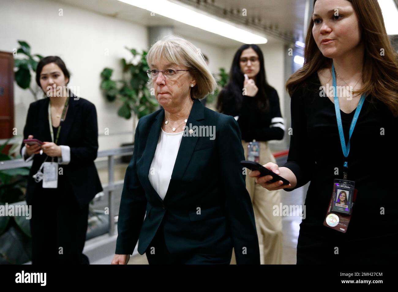 Sen. Patty Murray, D-Wash., center, walks on Capitol Hill in Washington ...