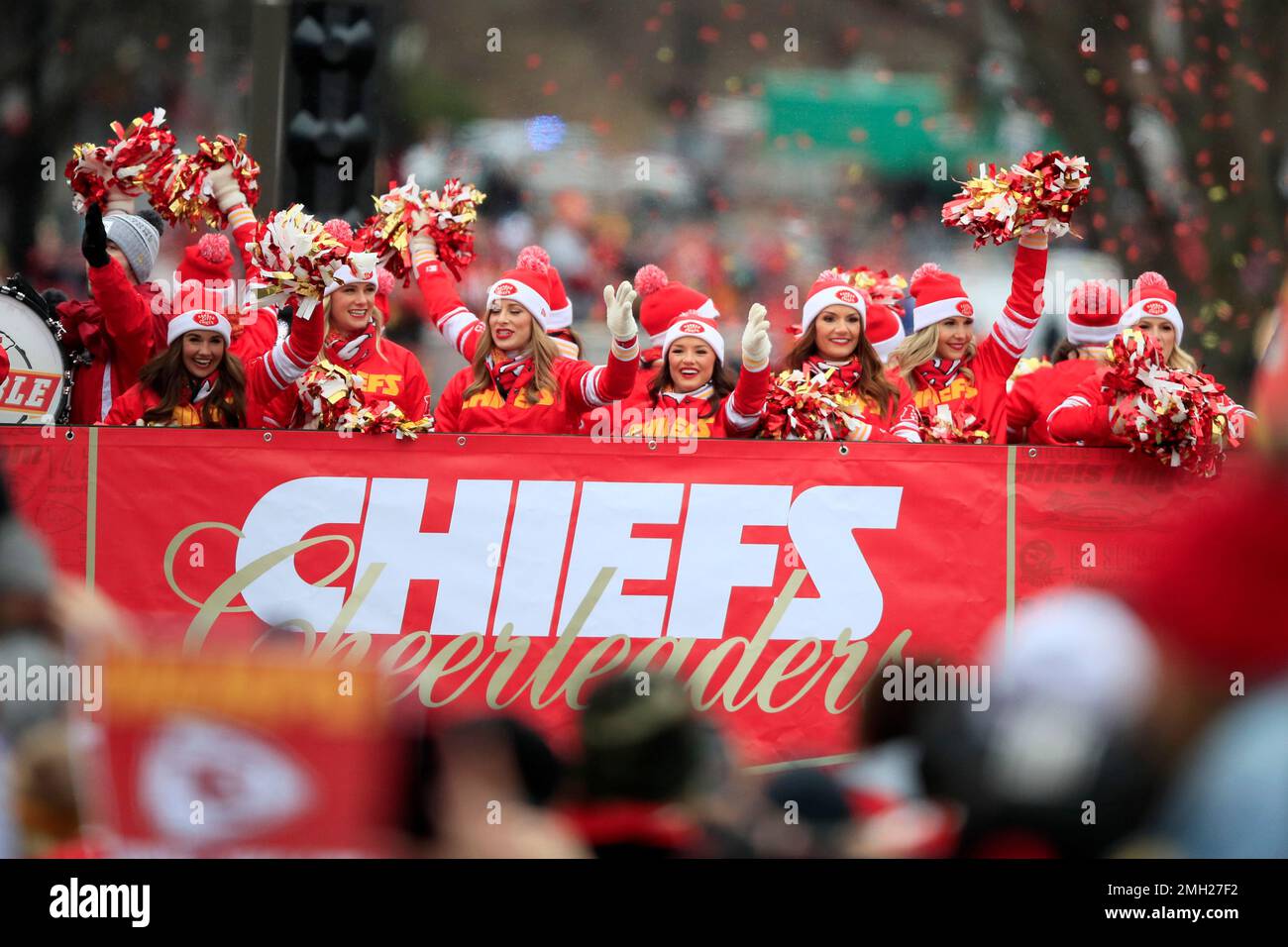 Kansas City Chiefs cheerleaders ride a float during the Super Bowl ...