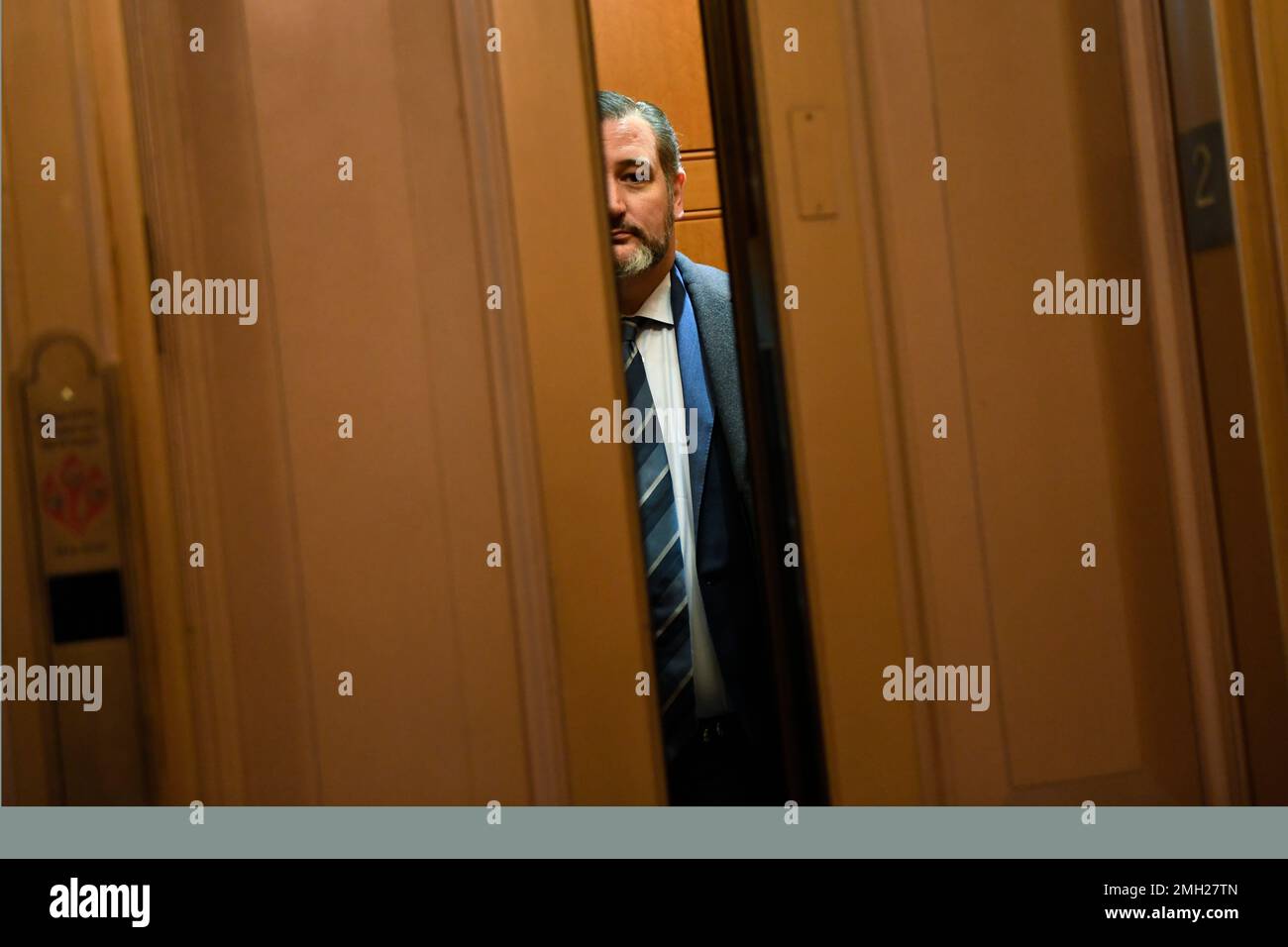 Sen. Ted Cruz, R-Texas, looks out from an elevator on Capitol Hill in ...