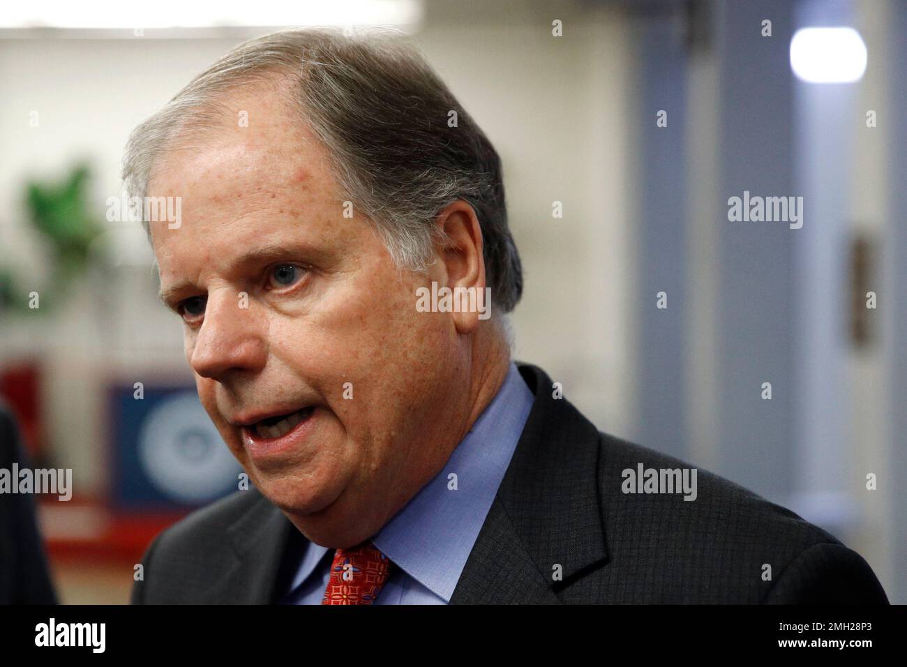 Sen. Doug Jones, D-Ala., speaks with reporters on Capitol Hill in ...