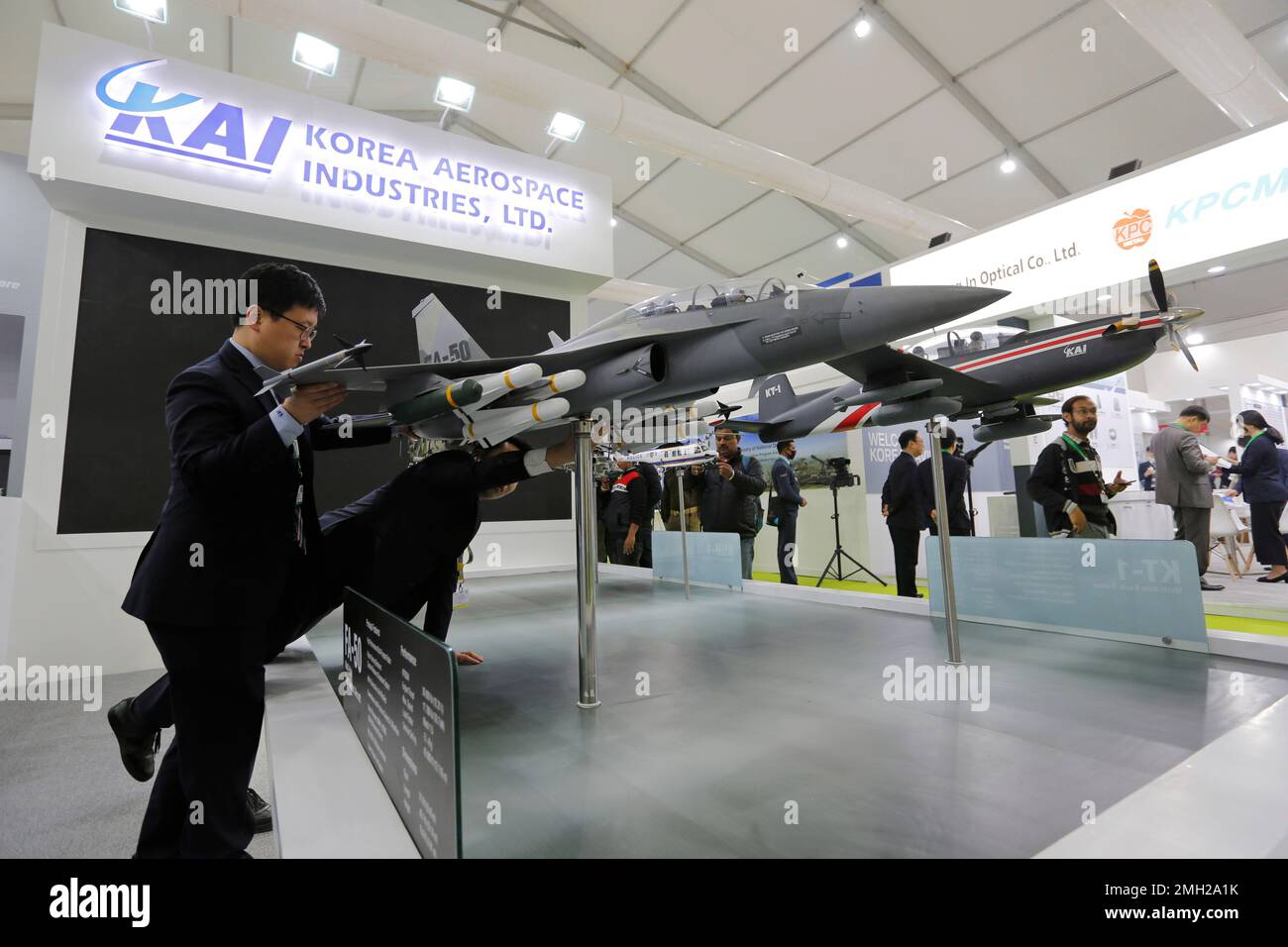 Exhibitors from South Korea’s Korea Aerospace Industries (KAI), arrange ...