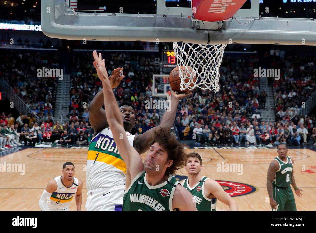 New Orleans Pelicans forward Zion Williamson (1) shoots over Milwaukee ...