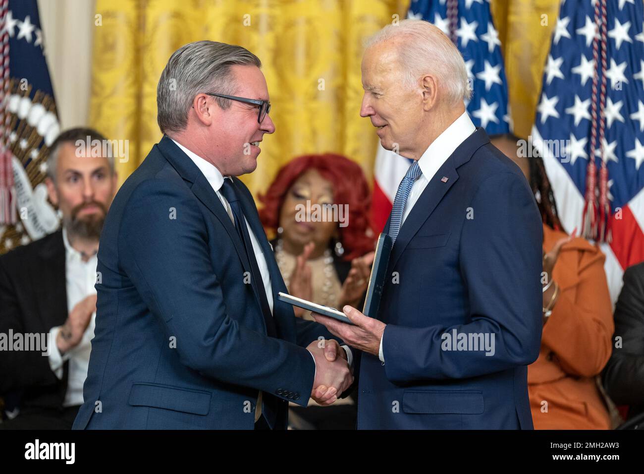 President Joe Biden presents the Presidential Citizens Medal to former ...