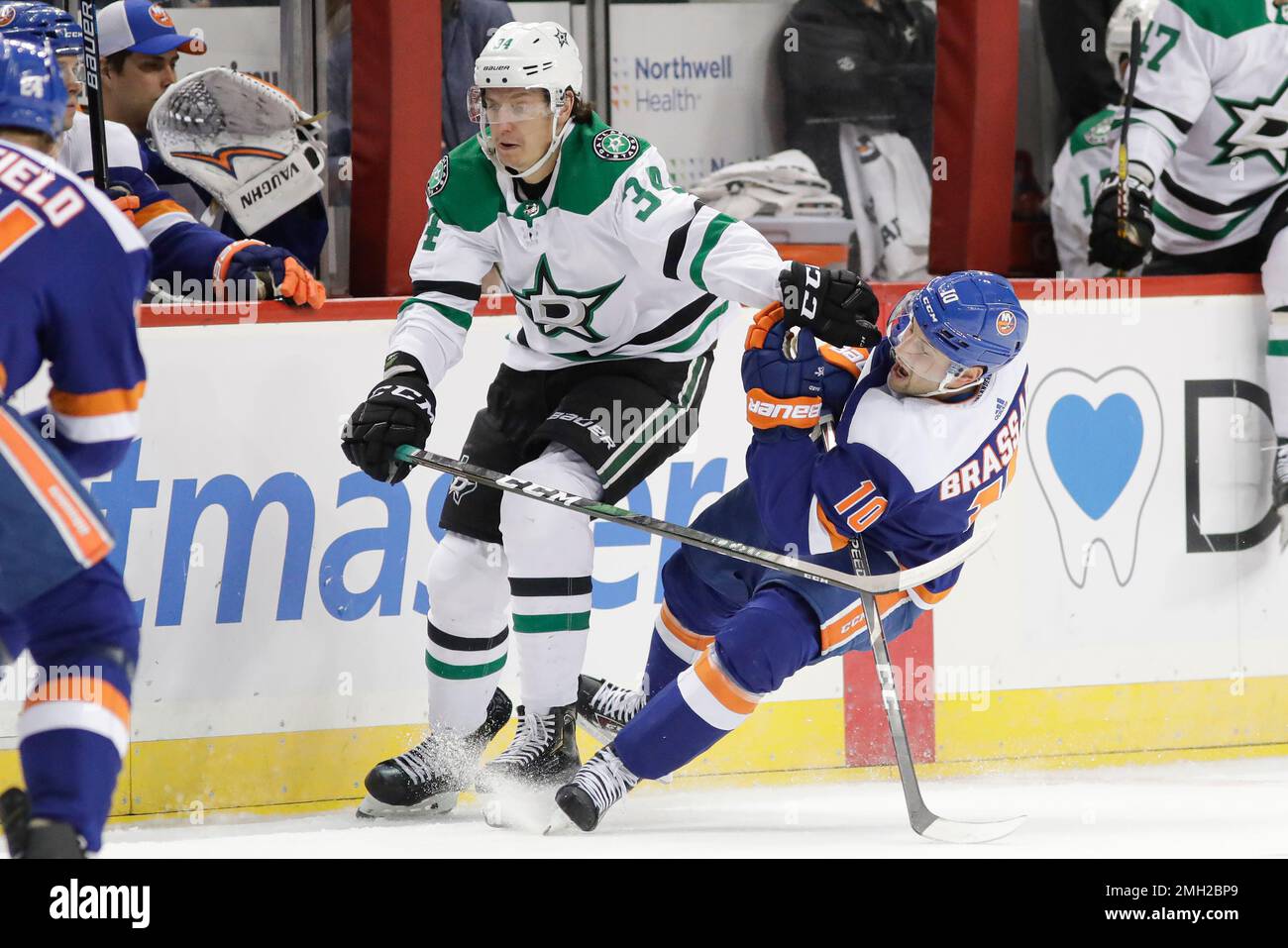 Dallas Stars' Denis Gurianov (34) fights for position with New York ...