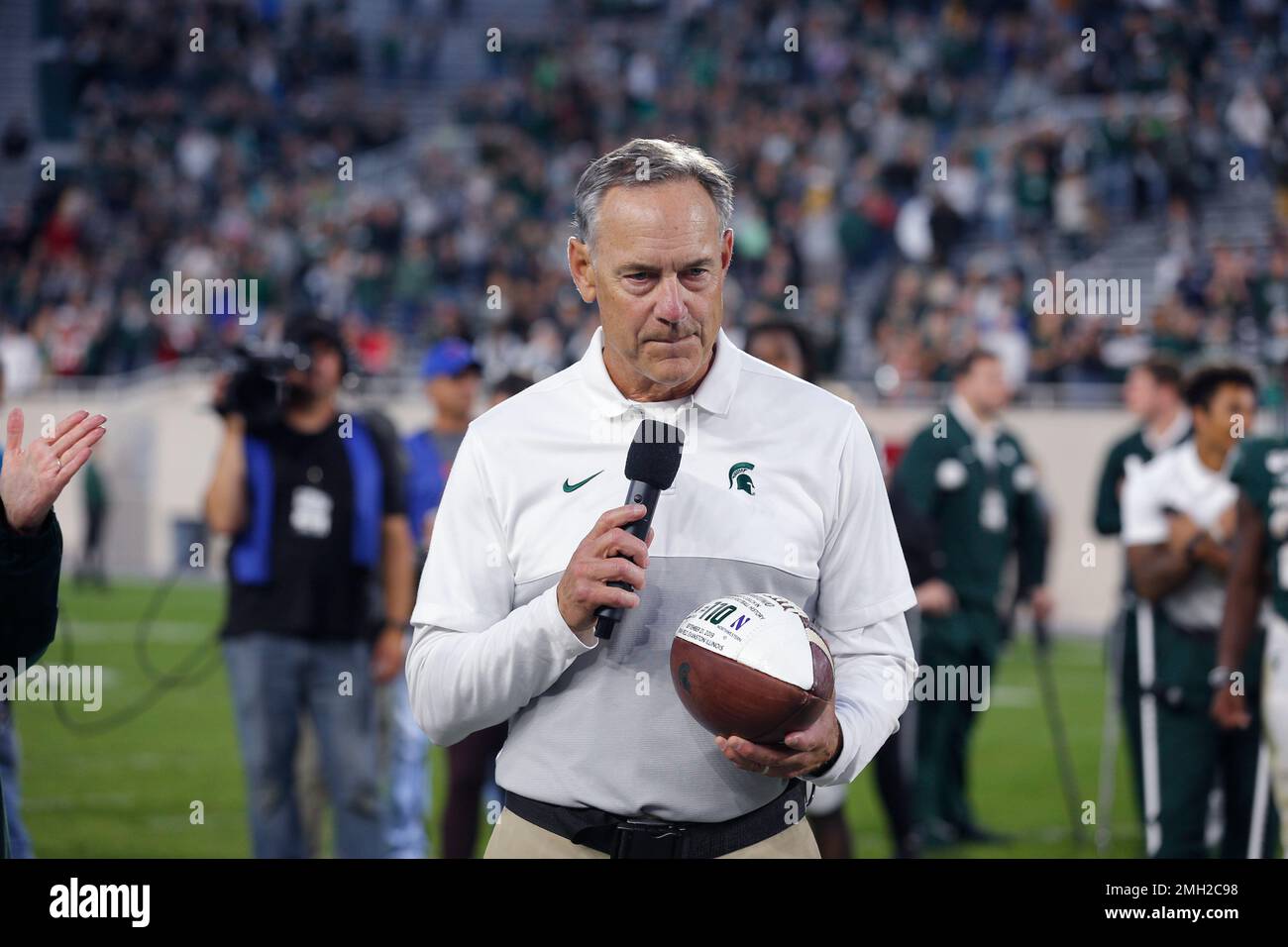 Michigan State coach Mark Dantonio addresses the crowd following an ...
