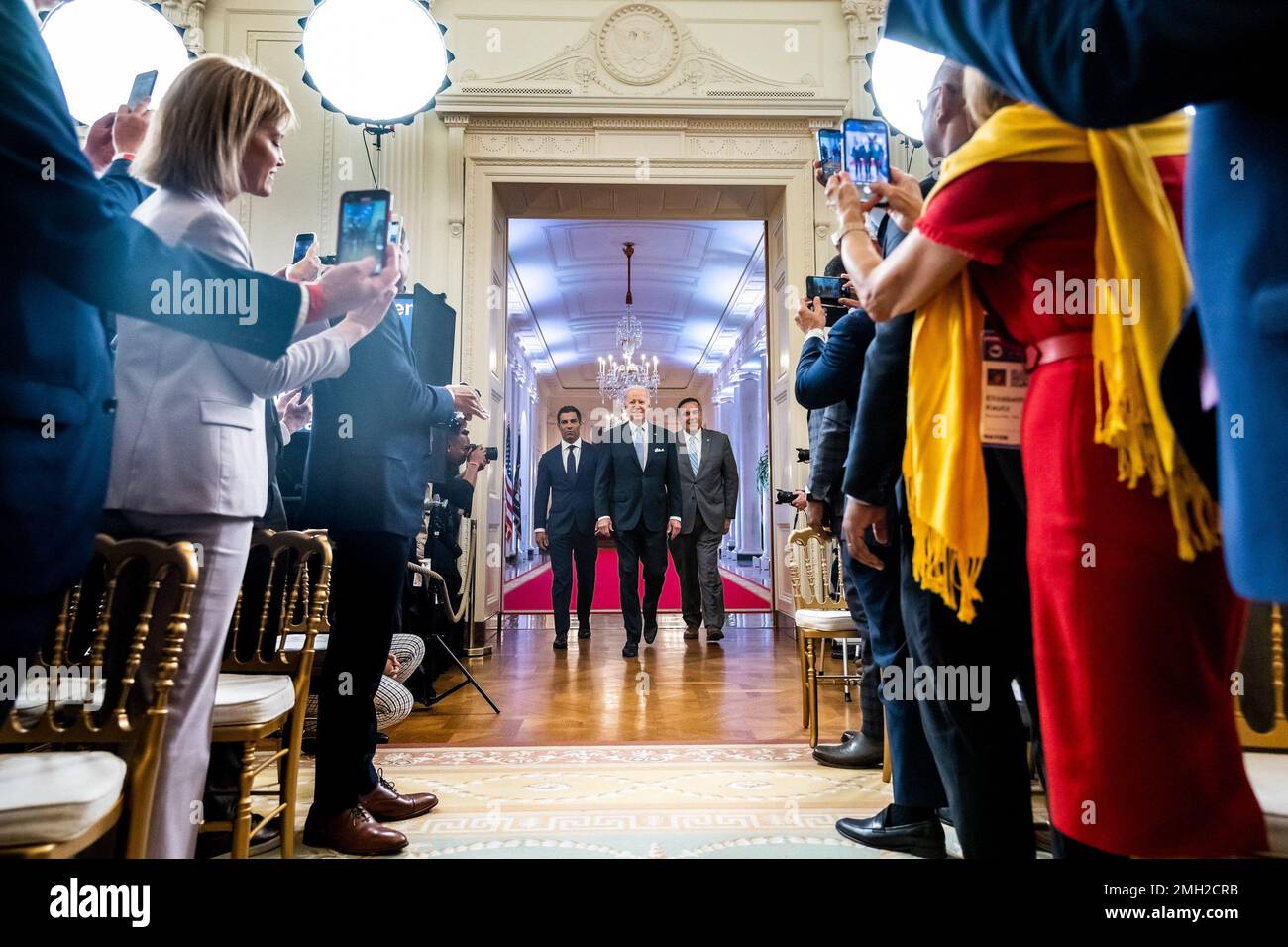 President Joe Biden arrives with Miami Mayor Francis Suarez, left, and ...