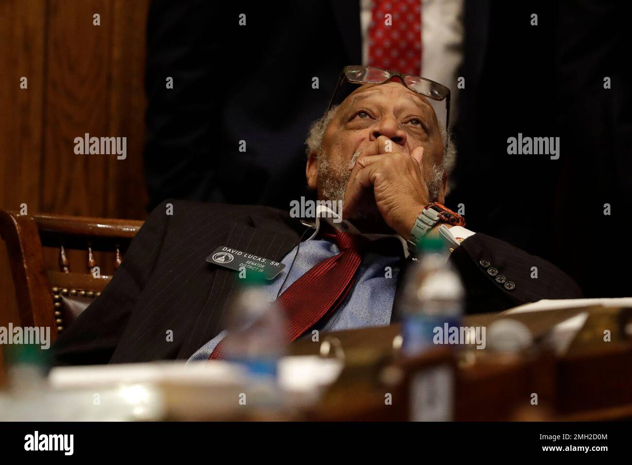 Sen. David Lucas, D-Macon, is shown at his desk on the floor of the ...