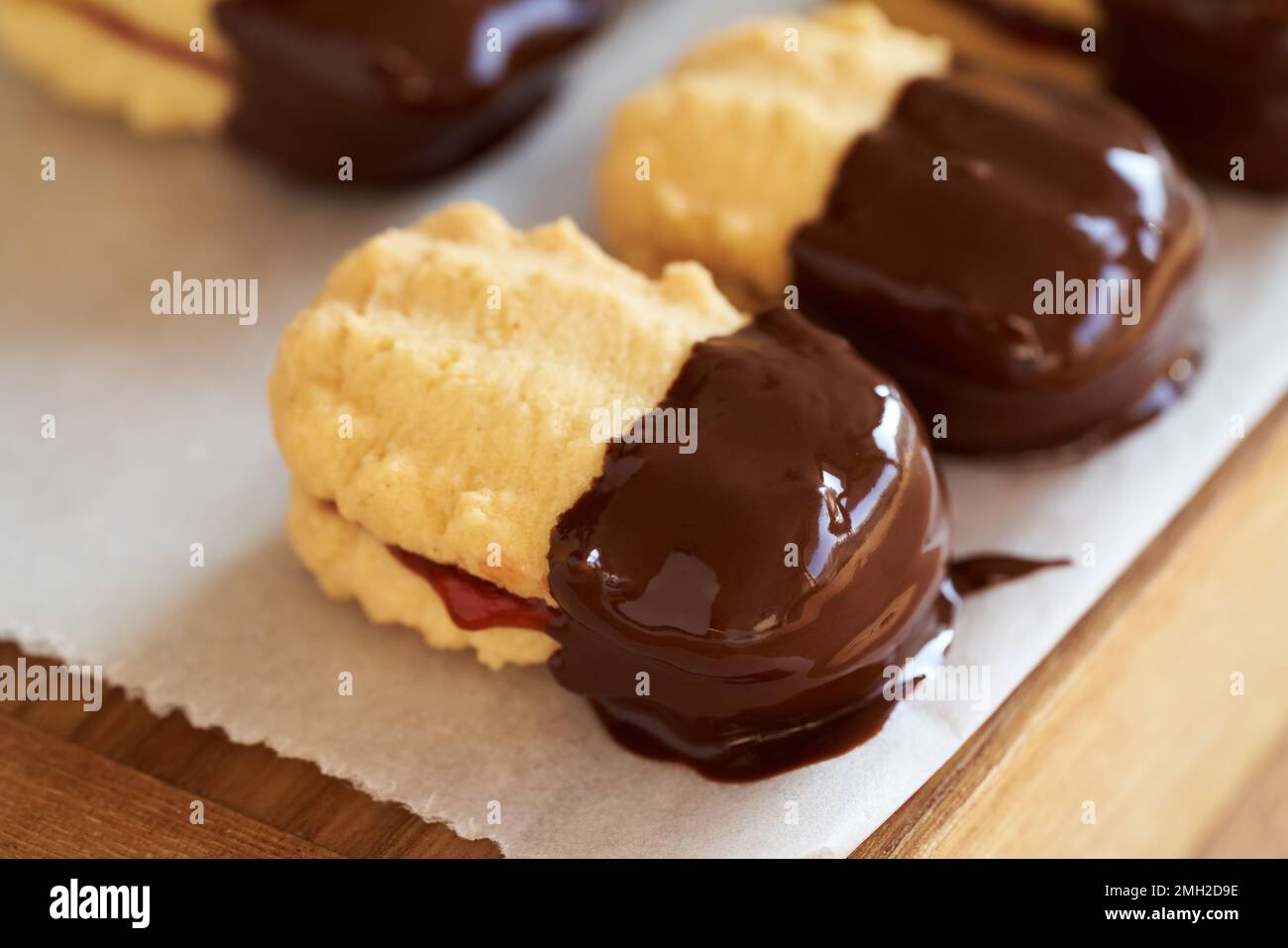 Traditional Christmas cookie filled with marmalade and dipped in ...