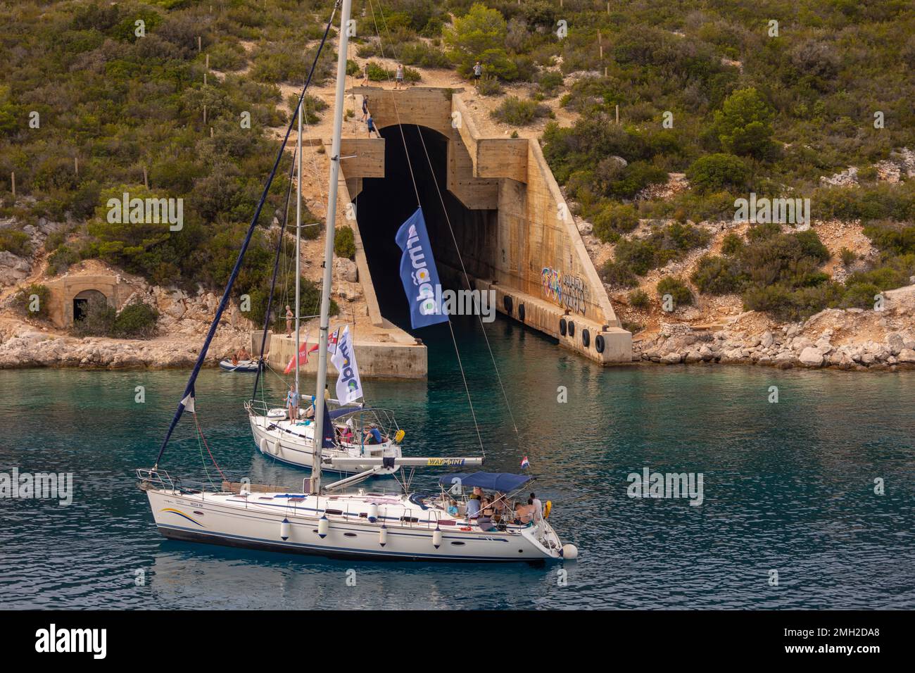 ISLAND OF VIS, CROATIA, EUROPE - Tourists on sailboats visit submarine ... ISLAND OF VIS, CROATIA, EUROPE - Tourists on sailboats visit submarine ...