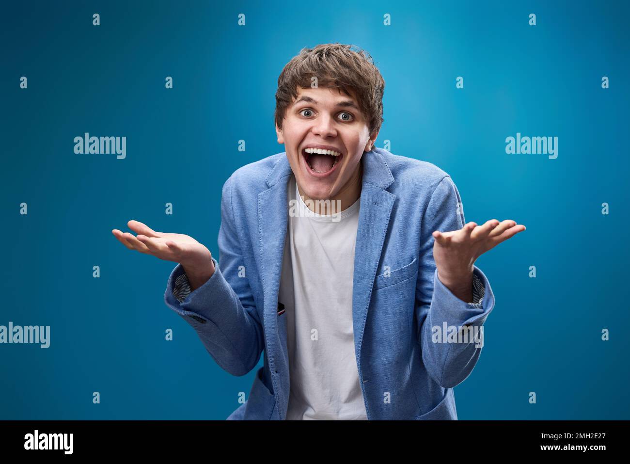 shocked man with surprise expression and excited face Stock Photo - Alamy