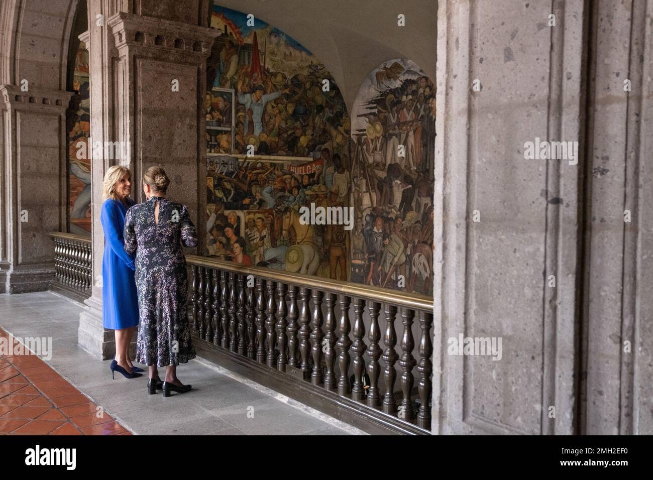 First Lady Jill Biden looks at Diego Rivera’s mural “The History of ...