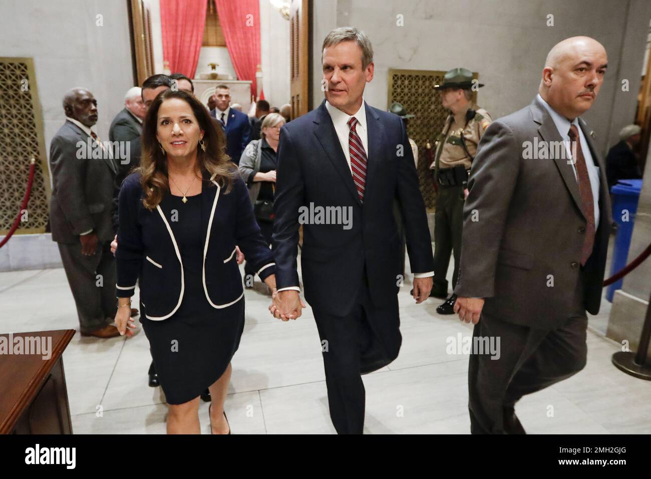 Tennessee Gov. Bill Lee, center, and his wife, Maria, leave the House ...