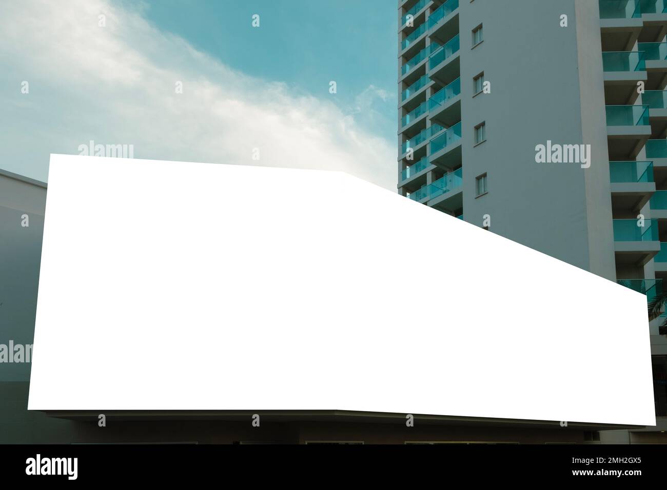 Blank white big mockup advertising sign above entrance of shop, hotel ...
