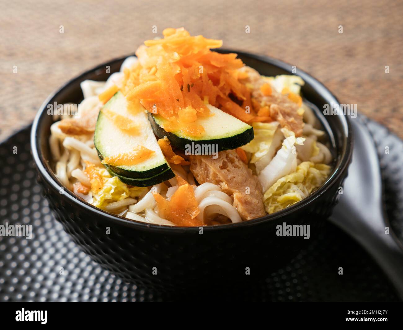 Asian soup with mie noodles, TVP, cabbage, zucchini and shredded ...