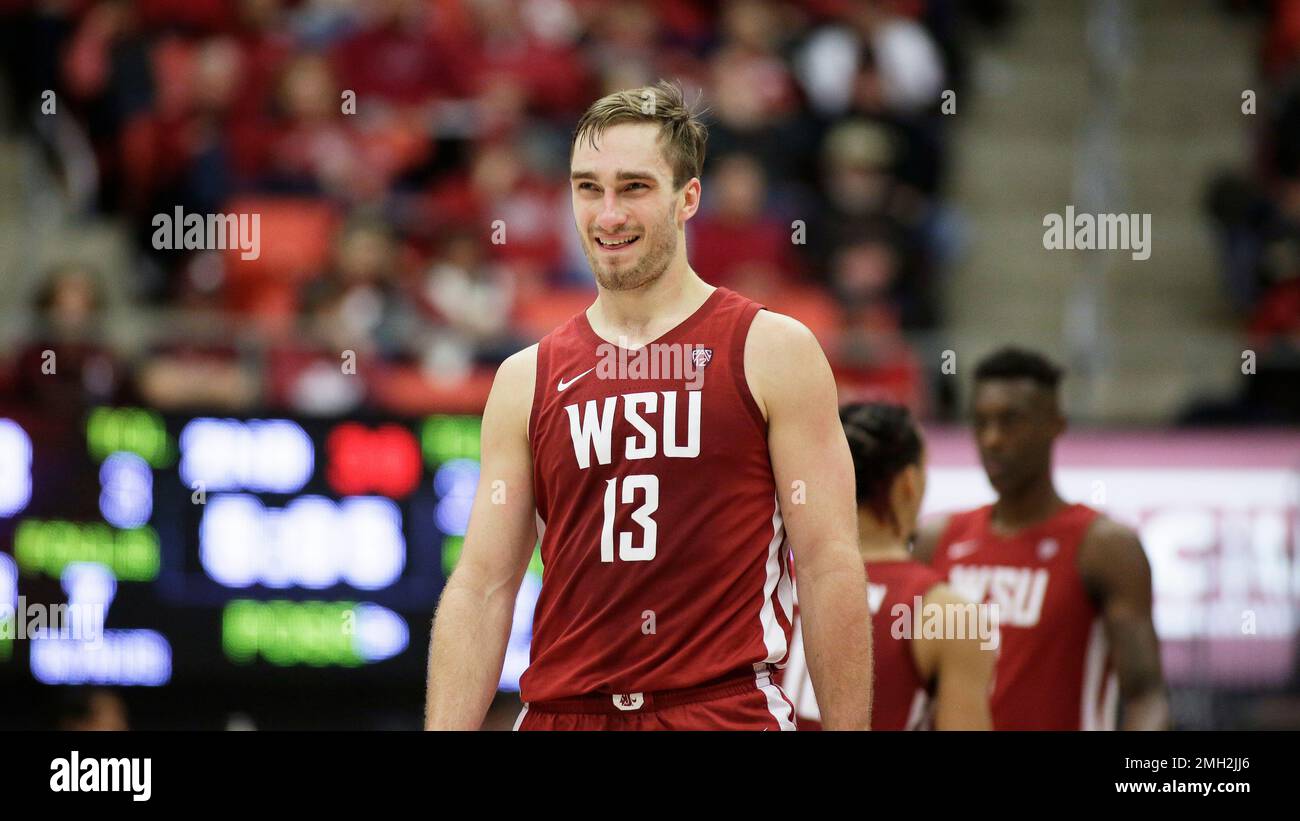 Washington State forward Jeff Pollard (13) walks on the court during ...