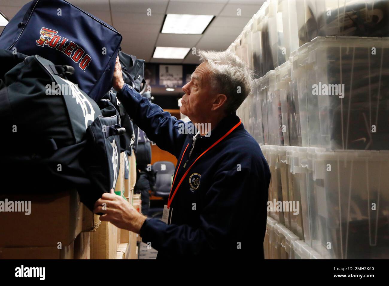 Jim Schmakel, Detroit Tigers clubhouse manager, looks over supplies at ...