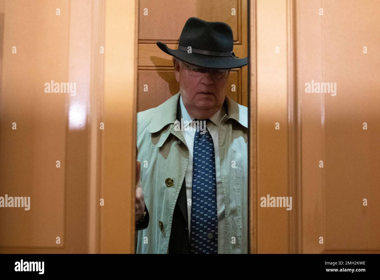 Ken Starr, an attorney for President Donald Trump, takes an elevator as ...