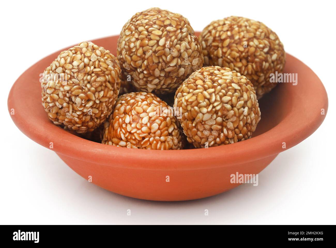 Sesame caramel laddu very popular in Indian subcontinent Stock Photo ...