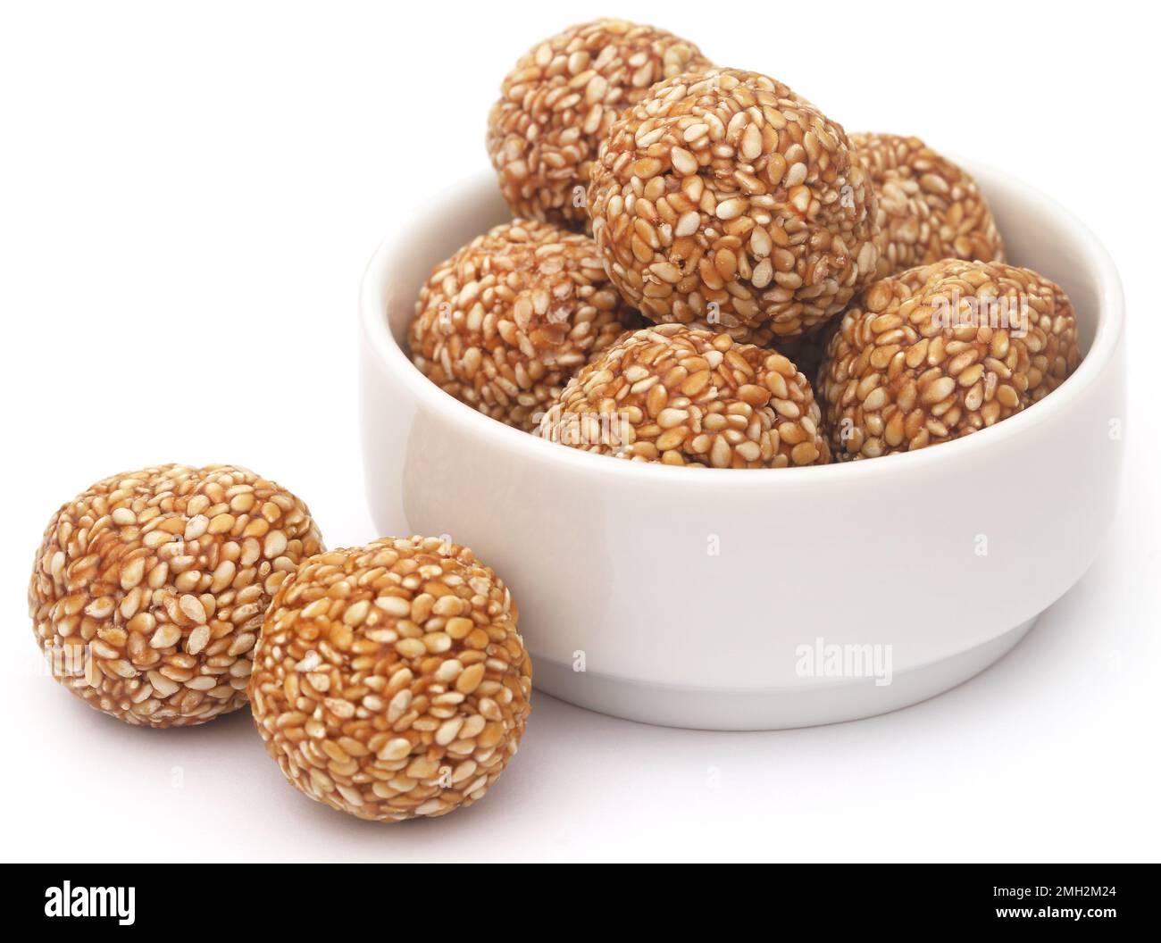 Sesame caramel laddu very popular in Indian subcontinent Stock Photo ...