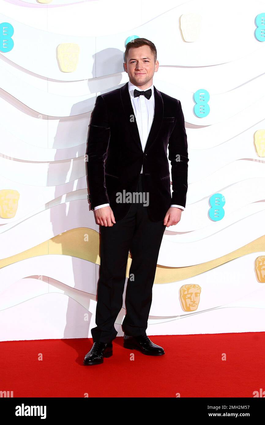 Actor Taron Egerton poses for photographers upon arrival at the Bafta ...