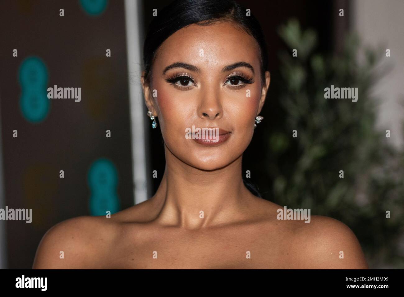 Maya Jama poses for photographers upon arrival at the BAFTA Film Awards ...