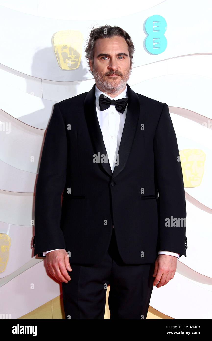 Actor Joaquin Phoenix poses for photographers upon arrival at the Bafta ...