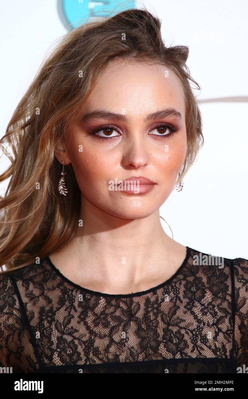 Actress Lily-Rose Depp poses for photographers upon arrival at the ...