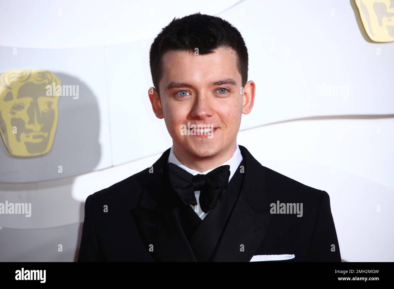 Actor Asa Butterfield poses for photographers upon arrival at the Bafta ...