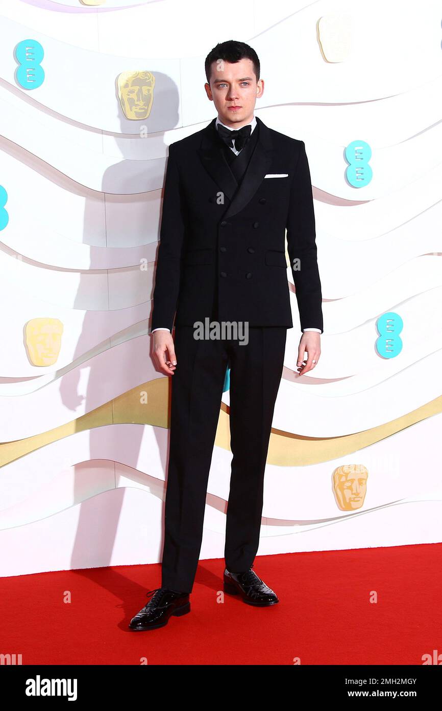 Actor Asa Butterfield poses for photographers upon arrival at the Bafta ...