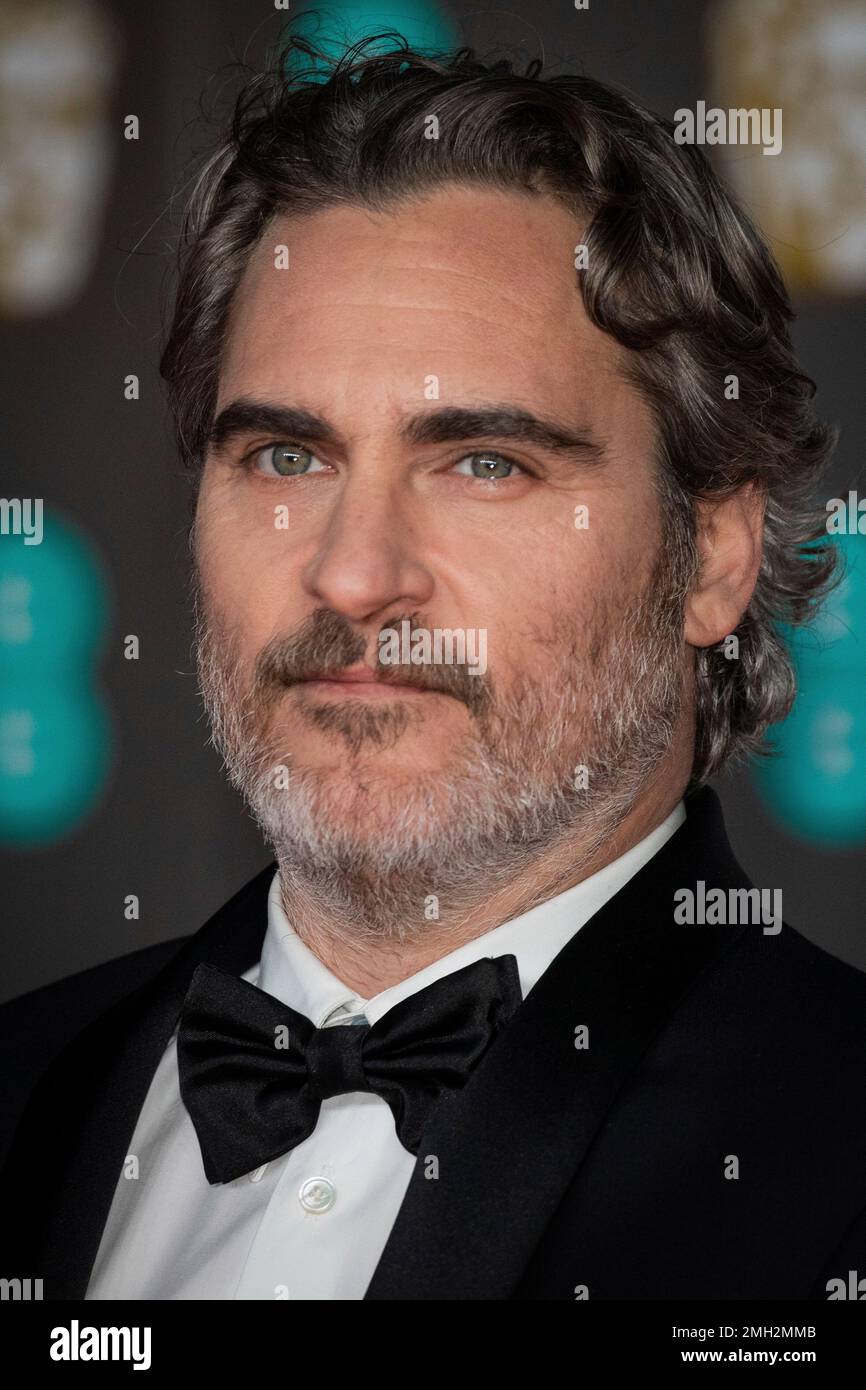 Actor Joaquin Phoenix poses for photographers upon arrival at the BAFTA ...