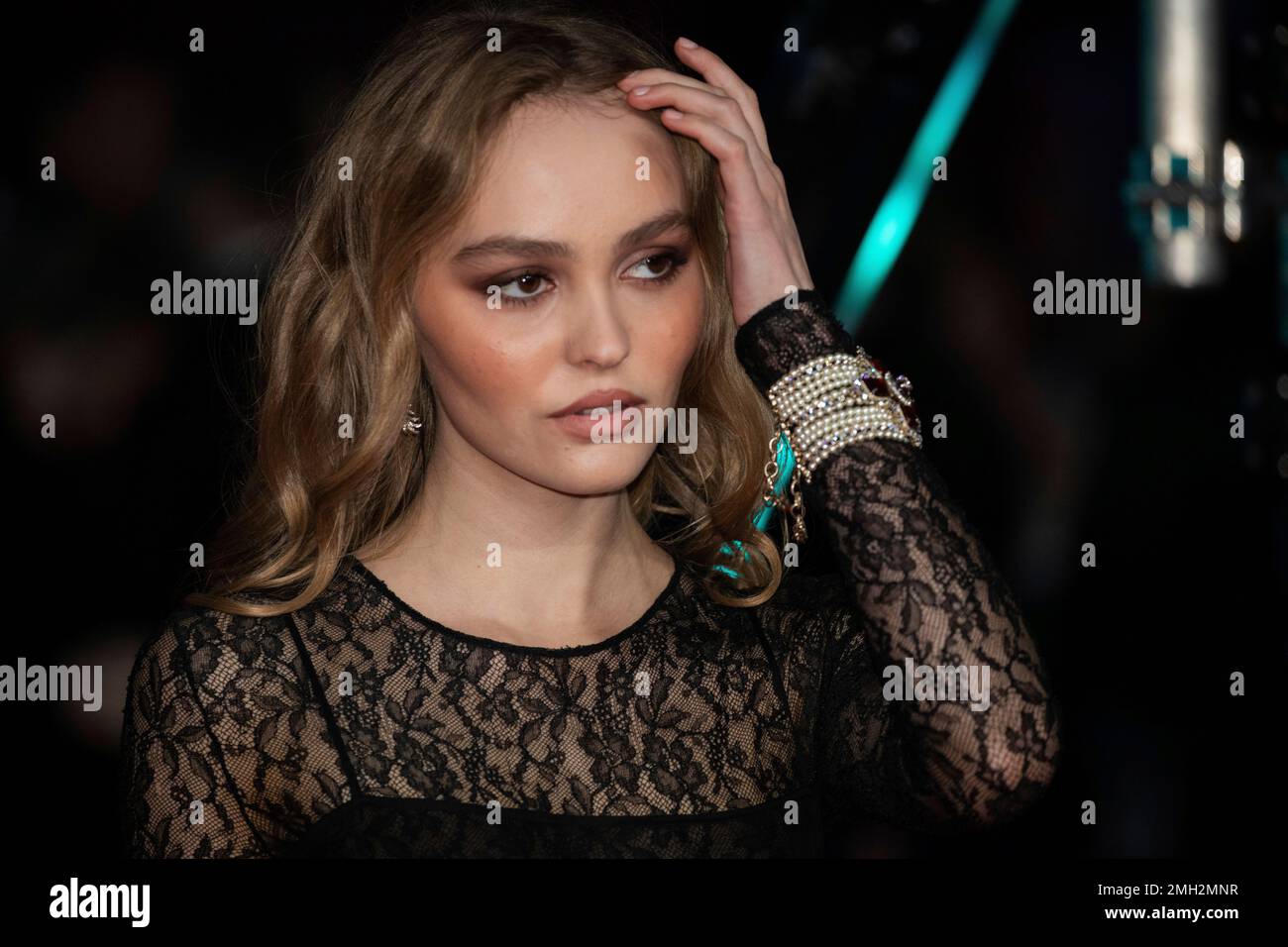 Actress Lily-Rose Depp poses for photographers upon arrival at the ...