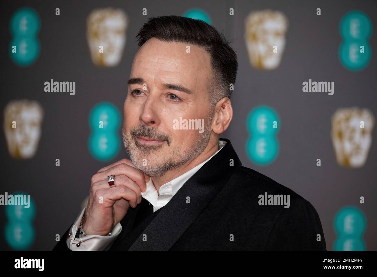 David Furnish poses for photographers upon arrival at the Bafta Film ...