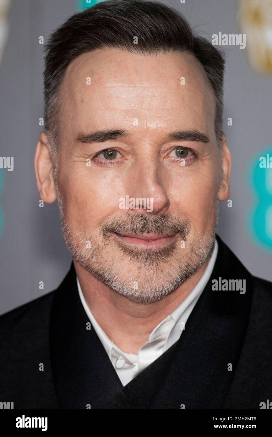 David Furnish poses for photographers upon arrival at the Bafta Film ...