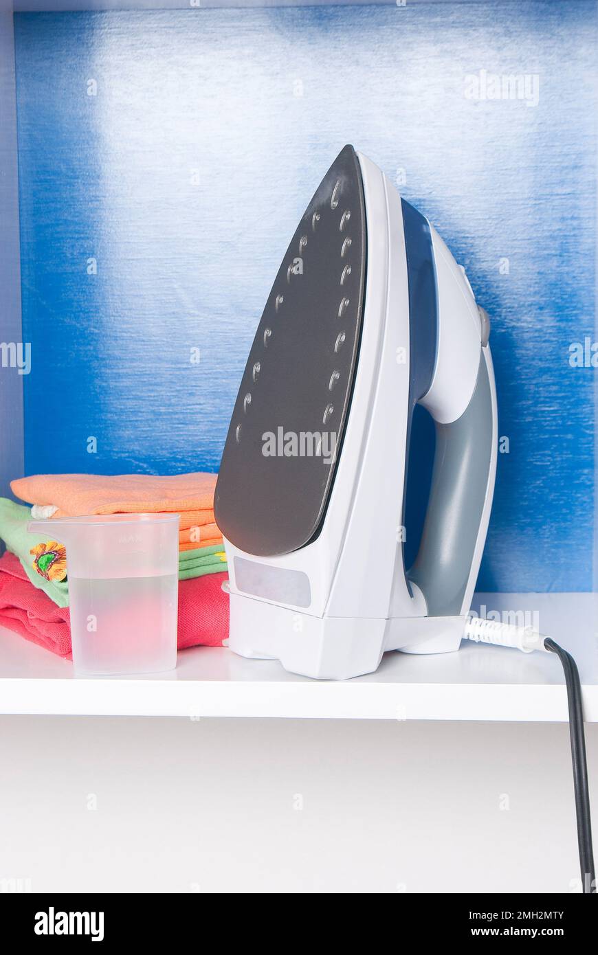Household appliance - Modern clothes iron Stock Photo - Alamy