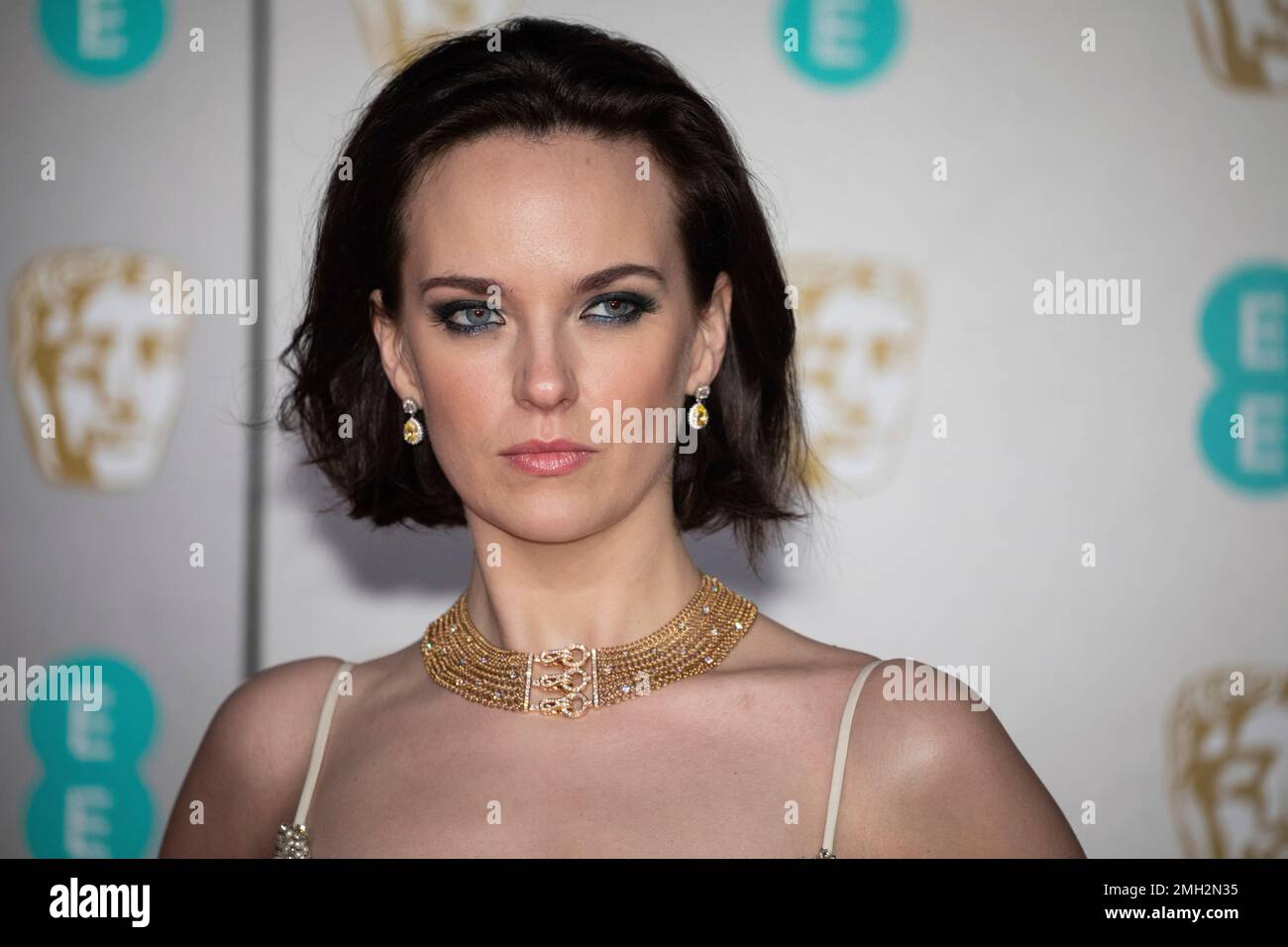 Charlotte Carroll poses for photographers upon arrival at the Bafta ...