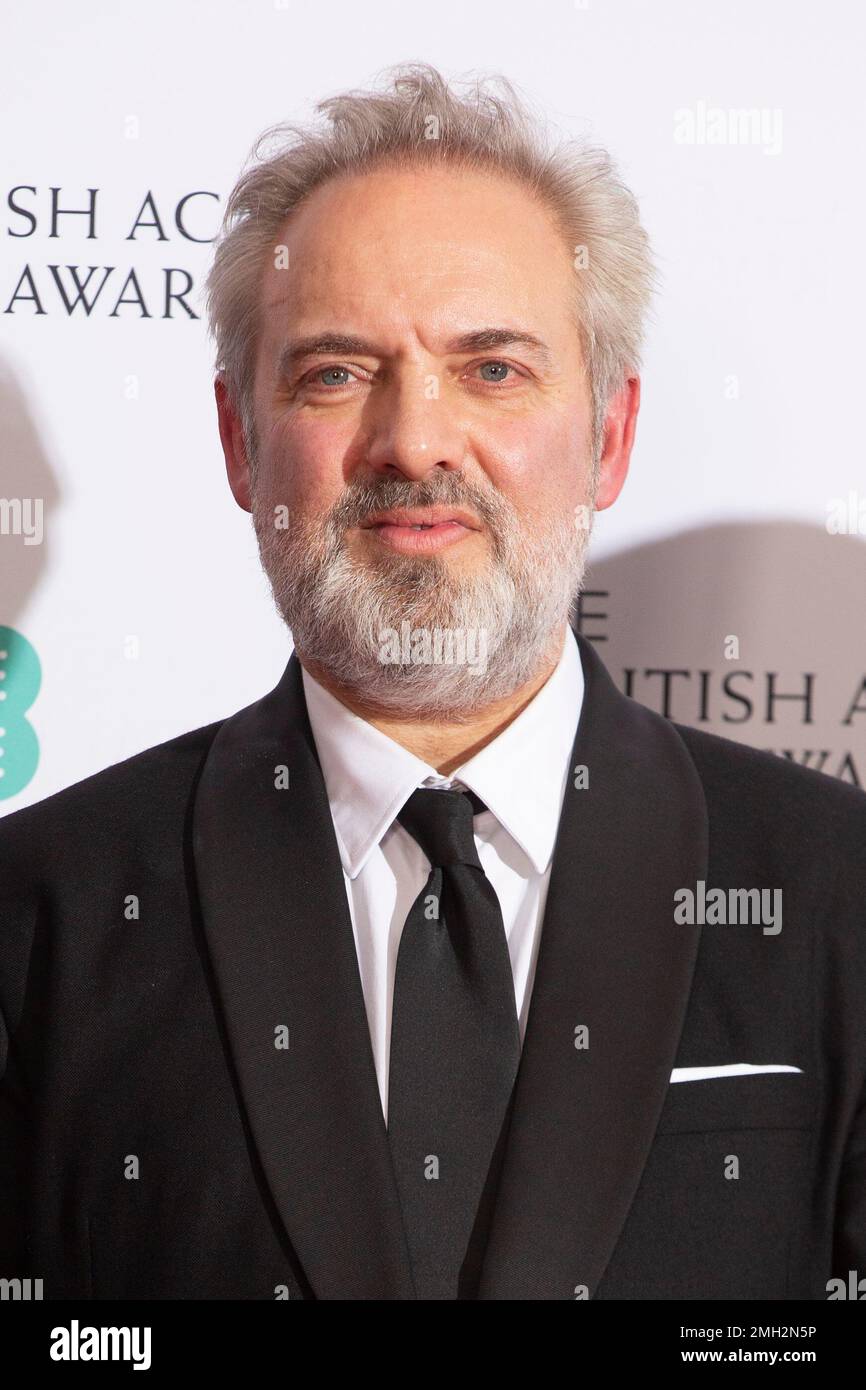 Director Sam Mendes poses with the Best Director award for 1917 ...