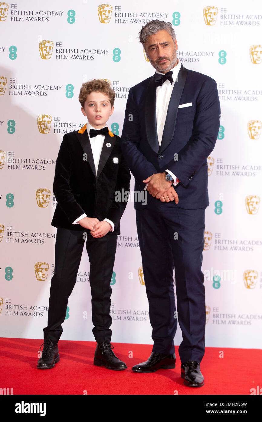 Actor Roman Griffin Davis, left and director Taika Waititi pose ...